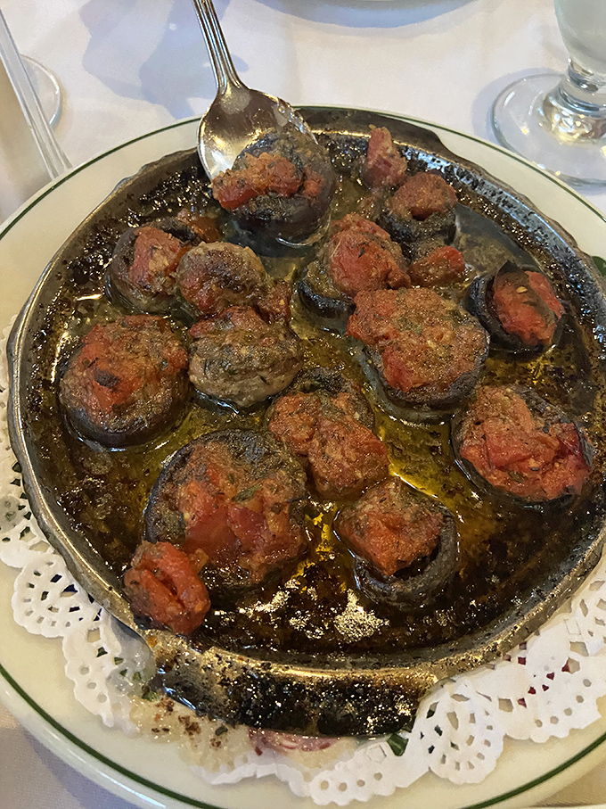 Escargot: where garlic butter transforms garden creatures into gourmet treasures. Conquer any hesitation&mdash;your taste buds will thank you.