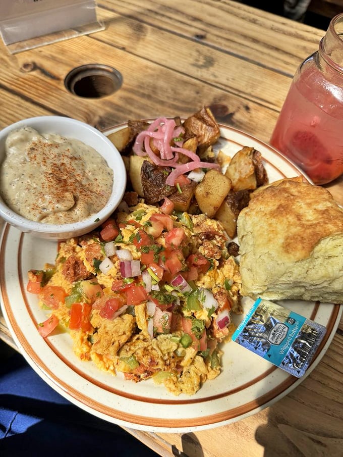 A breakfast fiesta on a plate. That scramble with fresh pico de gallo is doing the culinary equivalent of salsa dancing.