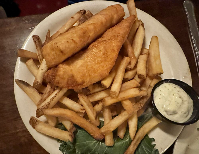 Fish and chips that would make a British pub proud, with a tartar sauce sidekick that deserves its own fan club.