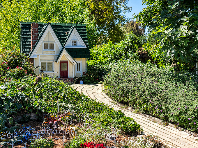 Not your average dollhouse&mdash;this fairy-tale cottage nestled among the greenery looks ready for Goldilocks or garden gnomes.