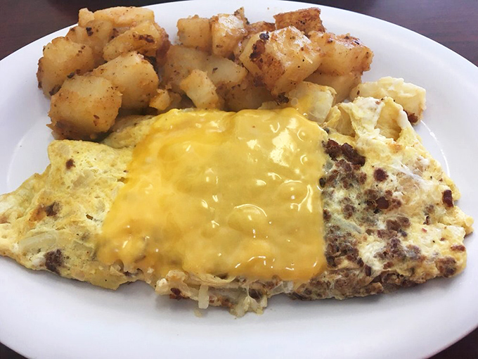 The farmer's omelet and home fries&mdash;a plate that says "You won't be hungry again until dinner" in the most delicious way possible.