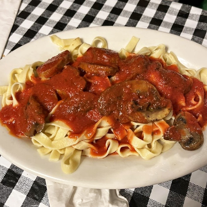Fettuccine with mushrooms that proves sometimes the simplest combinations create the most profound flavors. The sauce-to-pasta ratio? Perfection.