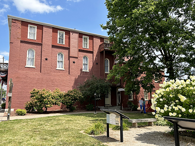 This stately brick building surrounded by hydrangeas looks like it belongs on a historical romance novel cover. The perfect backdrop for your "I found culture" vacation photos.