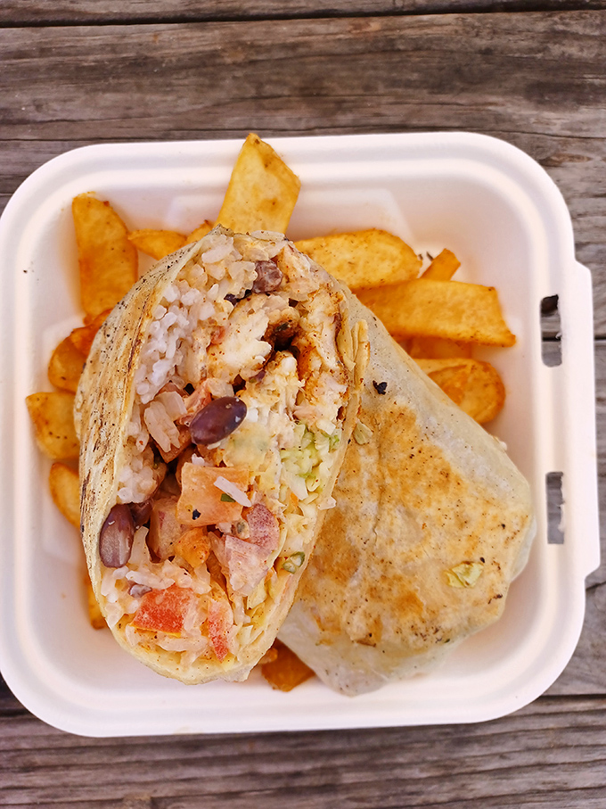 A burrito that doesn't mess around. Rice, beans, and seafood wrapped in a tortilla that's been kissed by the griddle gods.
