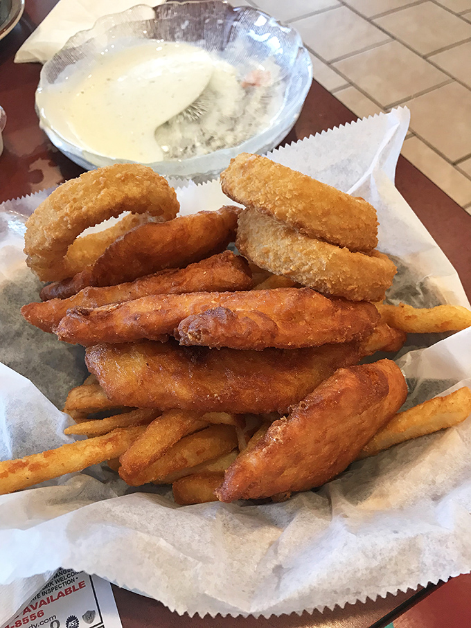 These fish and chips aren't just fried—they're transformed. Golden, crispy perfection with a side of nostalgia and enough tartar sauce for dunking adventures.