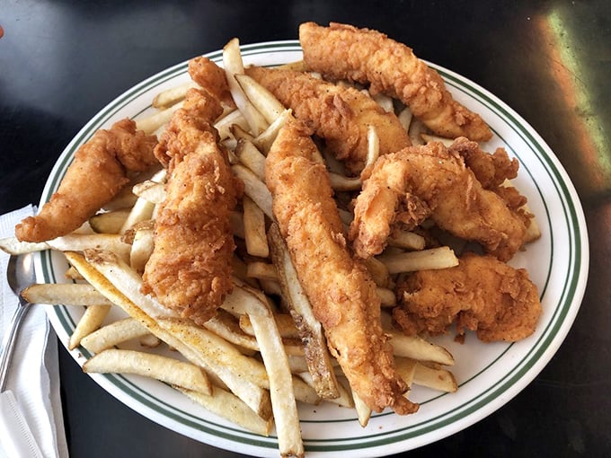 Fish and chips that would make a British pub jealous. Those golden-battered treasures aren't just fried&mdash;they're transformed into crunchy vessels of joy atop a bed of perfect fries.