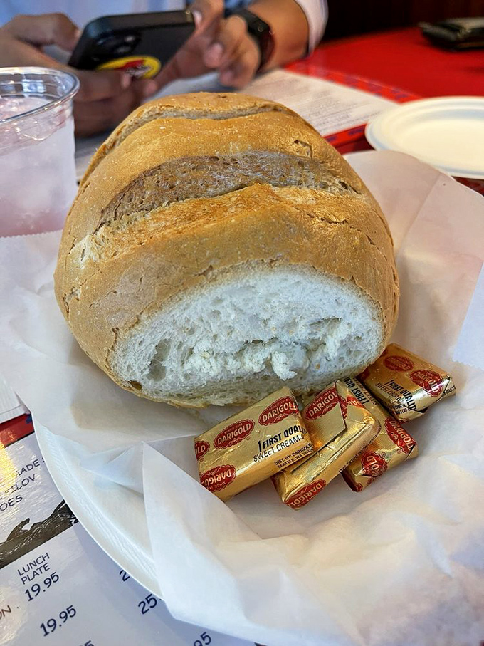 Their fisherman's bread arrives warm, ready to soak up every drop of that legendary chowder.