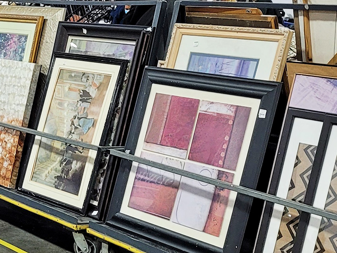 Wall art waiting for its second act. Yesterday's living room centerpiece becomes tomorrow's ironic statement piece or genuine design find.