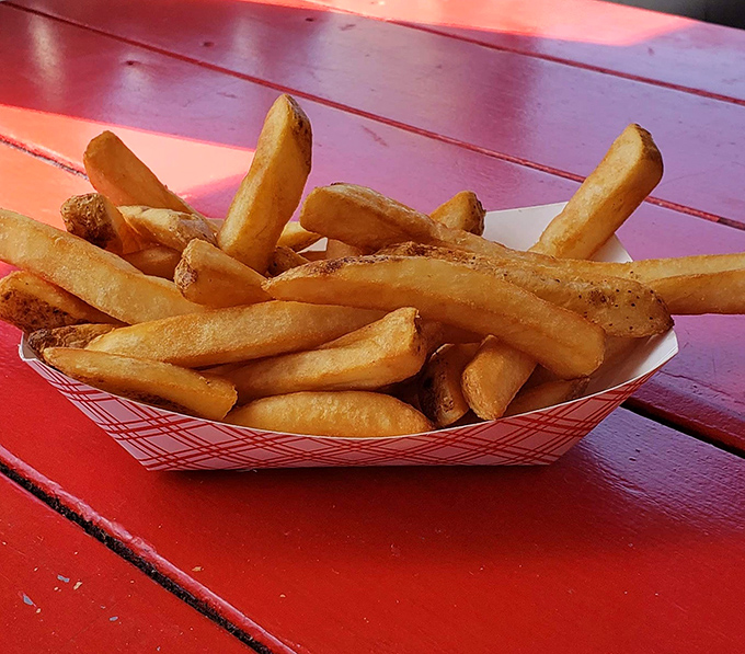 These aren't just french fries; they're the golden supporting actors that deserve their own Academy Award category at the seafood Oscars.