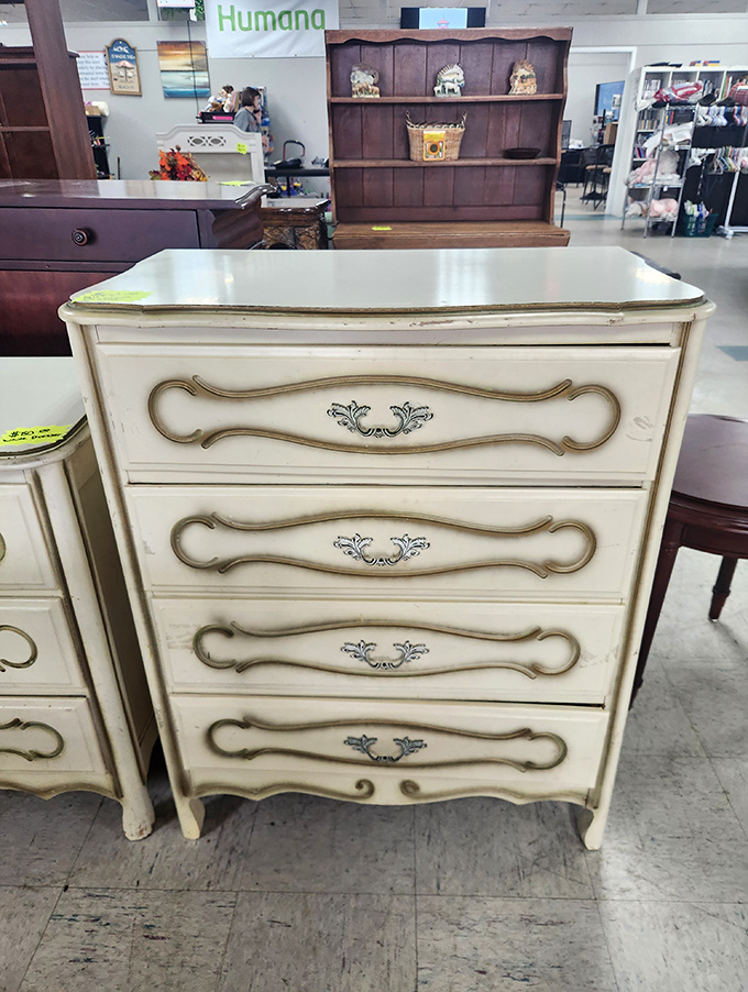 This elegant French Provincial dresser whispers tales of sophisticated bedrooms past. A statement piece waiting for its next chapter.
