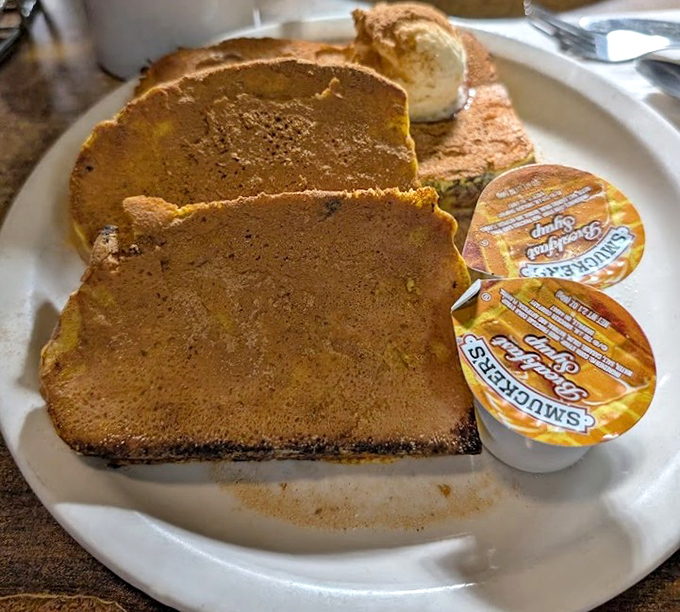 French toast with the golden hue of a Wisconsin sunrise. Add Smucker's syrup cups and you're experiencing breakfast the way your grandparents intended—simple and sublime.