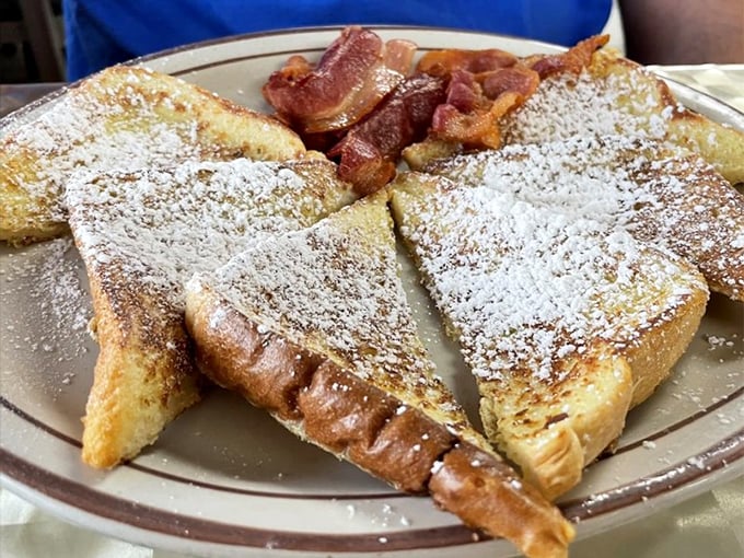 French toast dusted with powdered sugar alongside perfectly crisp bacon. Breakfast doesn't need to be complicated to be extraordinary.
