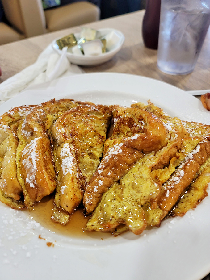 French toast that's achieved that magical golden-brown perfection – crisp edges, custardy center, and enough maple syrup to make Canadians jealous.