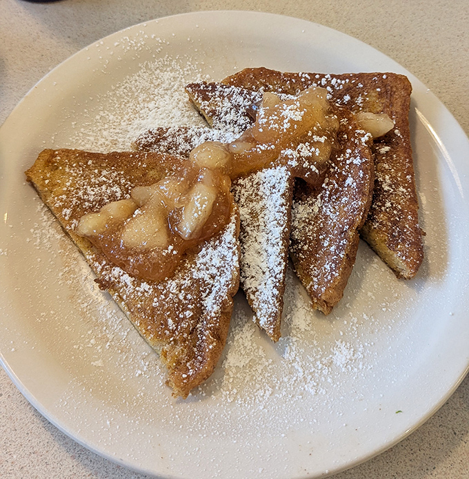 French toast that looks like edible sunshine, ready to brighten even the gloomiest Monday morning.