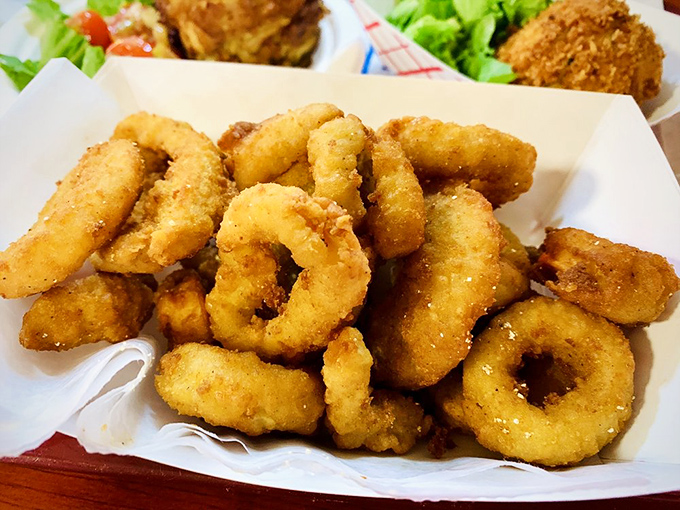 Fried calamari that shatters with each bite&mdash;the perfect balance of crunch and tenderness. No rubber bands here, just seafood perfection.