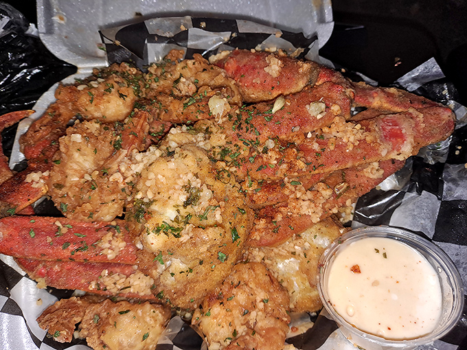 Fried crab legs and shrimp with a side of dipping sauce&mdash;because sometimes the best things in life require a little work and a lot of napkins. 