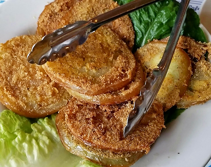 Fried green tomatoes &ndash; the South's gift to the culinary world. Tangy slices transformed into crispy, golden discs that disappear faster than summer lightning.