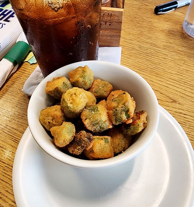 Fried okra: the South's answer to popcorn. These little nuggets disappear faster than your resolution to eat light.