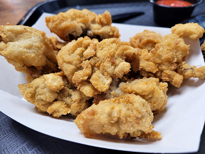 These golden-fried oysters aren't just appetizers&mdash;they're little nuggets of briny joy. Crispy outside, tender inside, happiness throughout.
