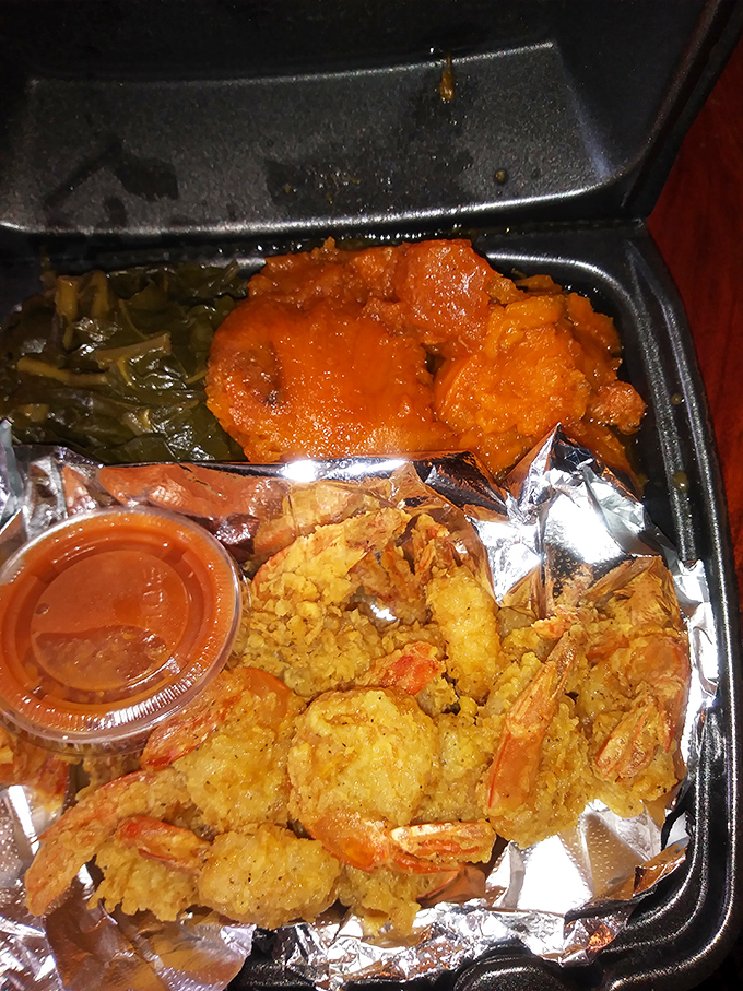 Golden beauties nestled like treasure in this takeout paradise—crispy shrimp that would make Forrest Gump proud.