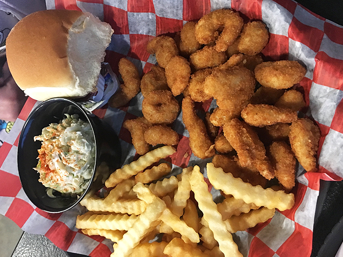 This basket of golden fried shrimp, fries, and coleslaw proves that Sneaky's seafood game is just as strong as its chicken reputation.