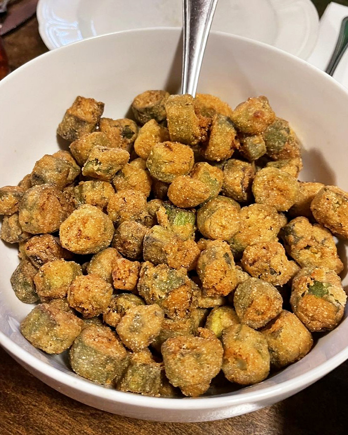Fried okra: the vegetable for people who think they don't like vegetables. Each golden nugget is like a crunchy little ambassador of Southern cooking. 