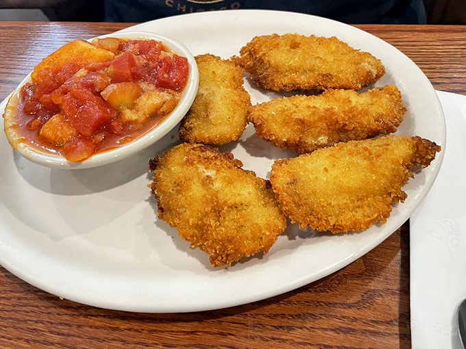 Fried oysters with the crunch of angels' wings, paired with a tangy sauce that makes your taste buds do the electric slide.
