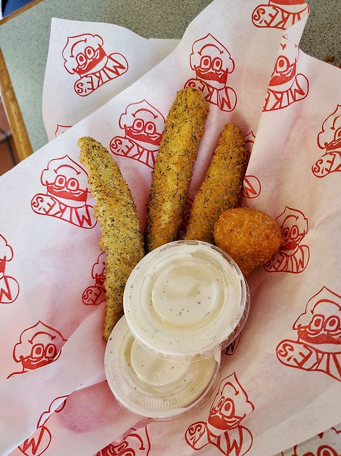 Fried pickles and mushrooms nestled on Mike's signature wrapper&mdash;proof that sometimes the best things come in humble packages.