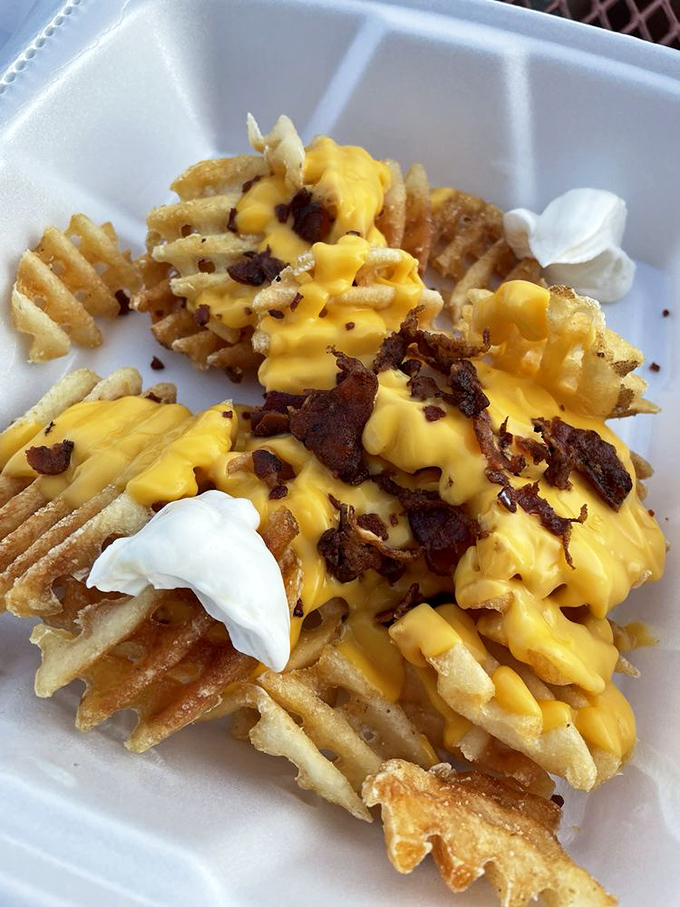 Loaded fries that don't just cross the line between side dish and main event&mdash;they dance over it with bacon bits and cheese sauce.