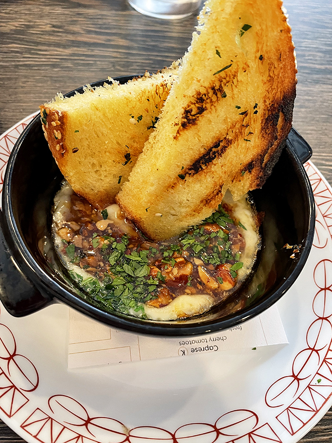 Garlic bread that's not playing around. This isn't your sad supermarket version &ndash; it's the heavyweight champion of the appetizer world.