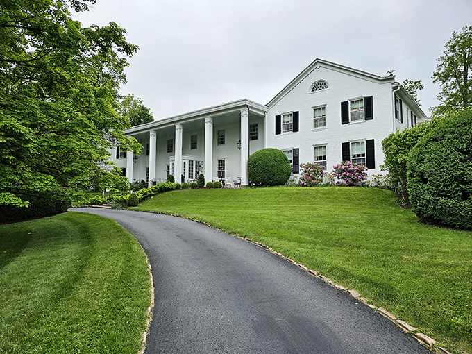 The General Lewis Inn's pristine white columns and manicured lawn whisper tales of Southern hospitality with a distinctly Appalachian accent.