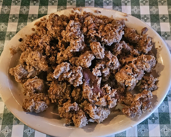A platter of golden-fried gizzards that would convert even the most offal-averse eater. Crispy outside, tender inside&mdash;the perfect introduction. 