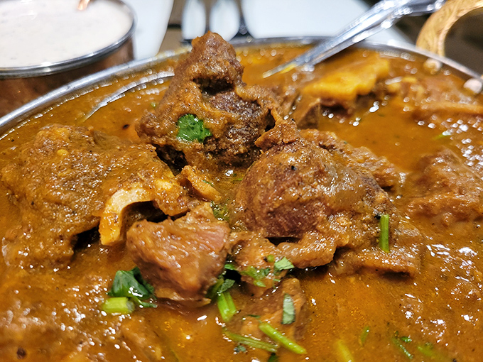 This Goat Curry doesn't kid around&mdash;tender chunks swimming in a sauce so complex it deserves its own biography.