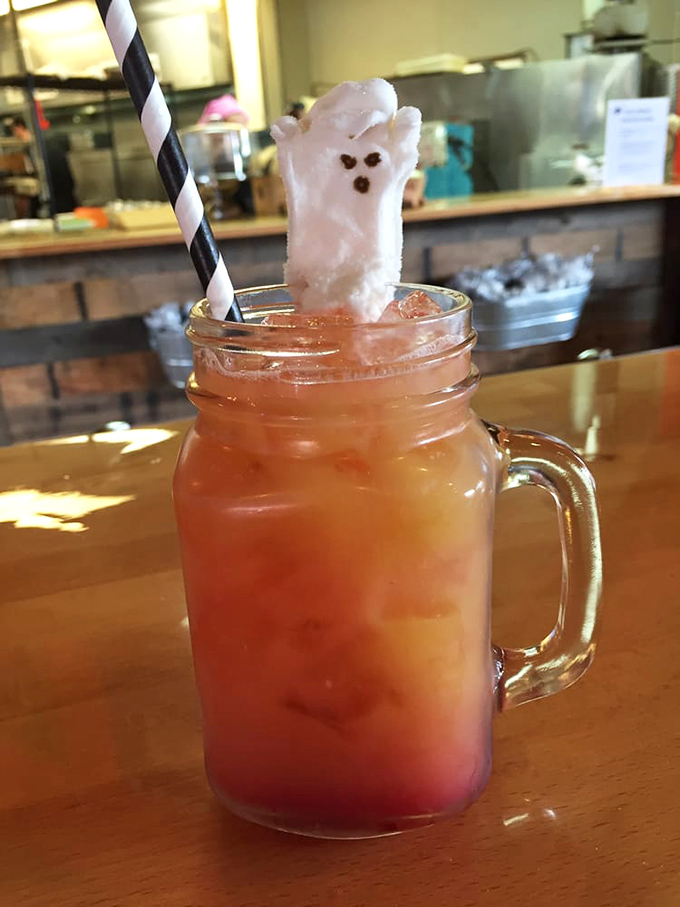 The "Grave Digger" cocktail brings Halloween spirit year-round with its fruity punch and adorable marshmallow ghost. Spooky deliciousness that's worth raising from the dead for!