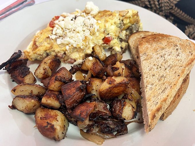 This Greek omelet with home fries and toast isn't just breakfast&mdash;it's a Mediterranean vacation for your taste buds without the airfare.