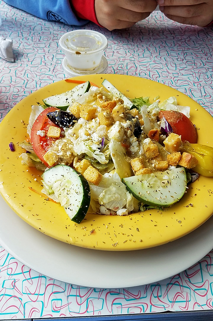 Even the Greek salad gets the diner treatment &ndash; fresh, colorful, and generous enough to share (but why would you?).