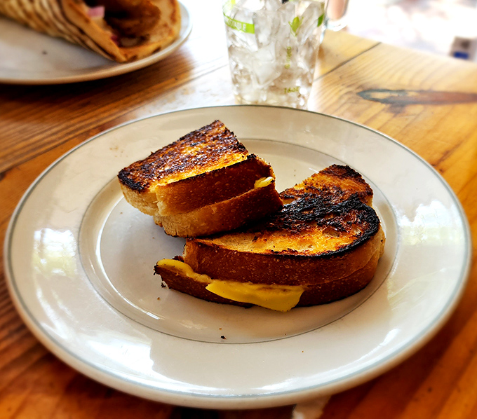 The grilled cheese sandwich sports that perfect golden crust that makes you want to do a happy little food dance.