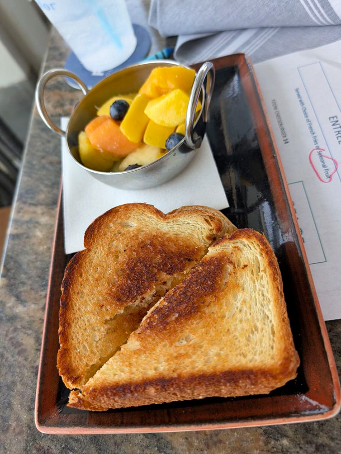 Comfort food gets the five-star treatment. This grilled cheese and fresh fruit would make both your cardiologist and inner child happy.
