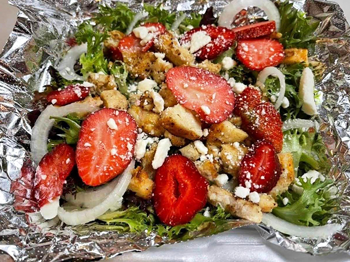 Who knew a salad could look this exciting? Fresh strawberries and feta transform ordinary greens into something worth crossing town for.