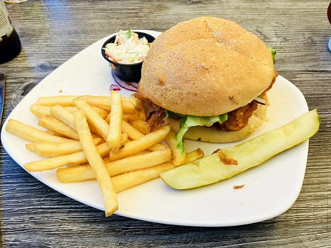 A sandwich that says "vacation" with every bite. Golden fries, a pickle spear standing at attention, and coleslaw that didn't come from a bucket.