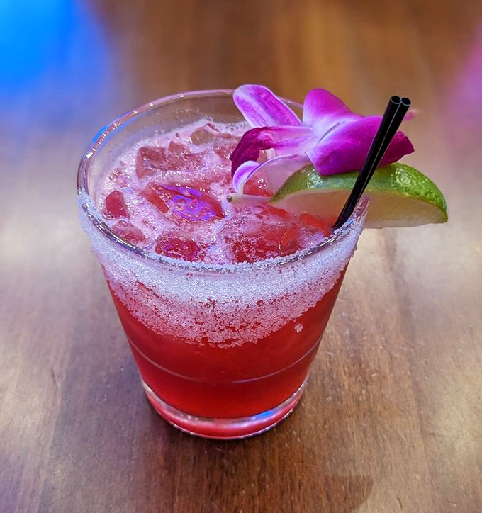 This vibrant hibiscus cocktail doesn't just look Instagram-worthy &ndash; it tastes like summer vacation in a sugar-rimmed glass.