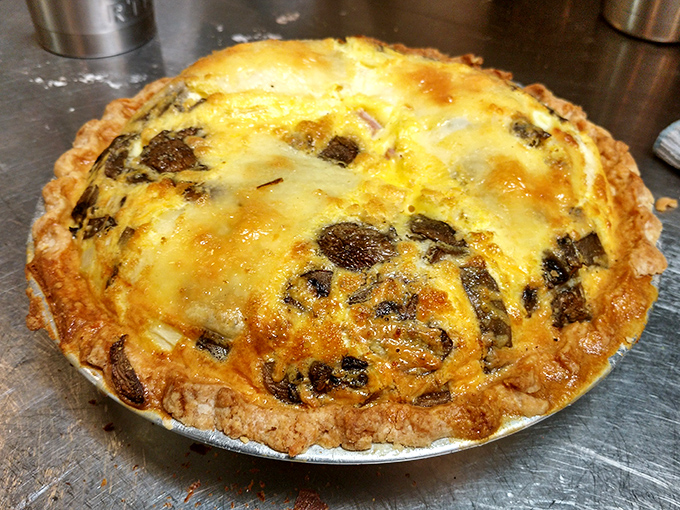 This quiche isn't just breakfast&mdash;it's architectural genius, with layers of ham, onion, and mushroom supporting that perfect cheesy dome.
