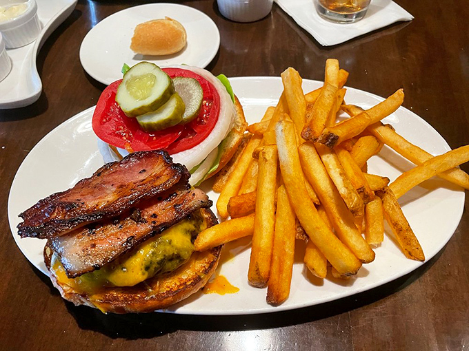 Burger perfection isn't complicated: quality beef, melty cheese, crisp vegetables, and bacon that should win awards. Those fries aren't just sides&mdash;they're co-stars.