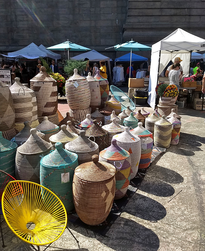 Handwoven baskets in a rainbow of patterns. Each one traveled farther to get here than most New Yorkers do in a month.