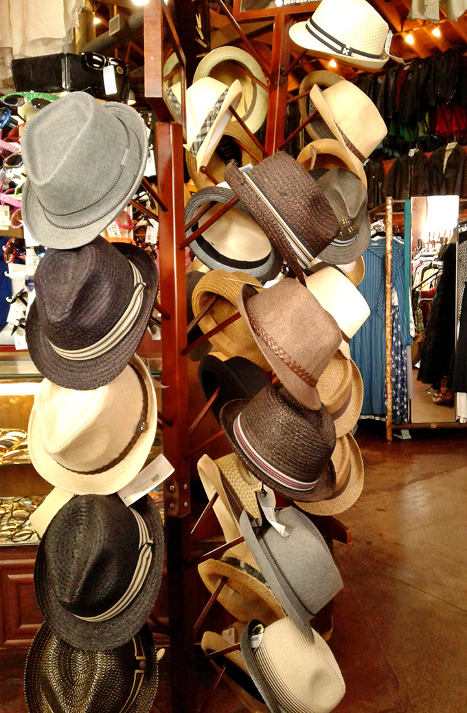 A tower of fedoras, panamas, and trilbies waiting to crown new owners. Somewhere, Frank Sinatra is nodding in approval.