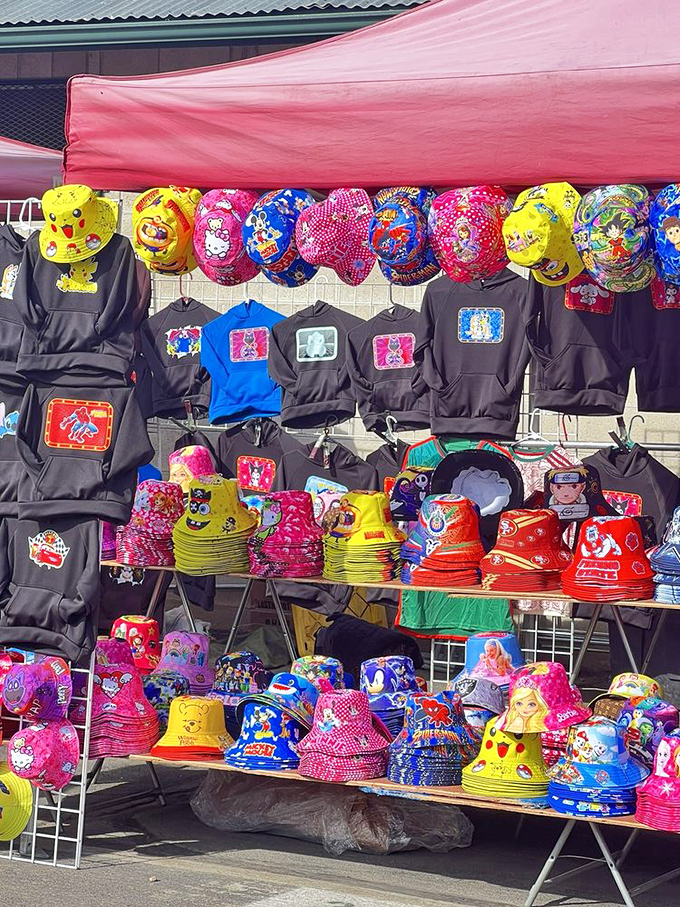 Hat-tastic fashion central! These vibrant bucket hats and character-adorned hoodies showcase the colorful intersection of comfort and style.