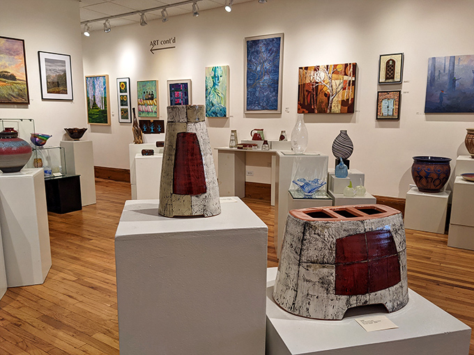 The Hillsborough Gallery of Arts showcases local talent in a space where pottery, paintings, and sculptures converse with each other across wooden floors.
