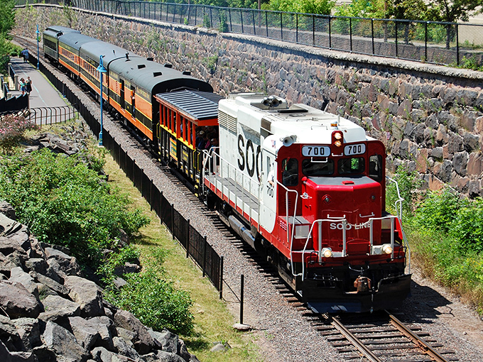 The workhorse of the North Shore line cuts a striking silhouette against Minnesota's summer landscape &ndash; industrial poetry in motion.