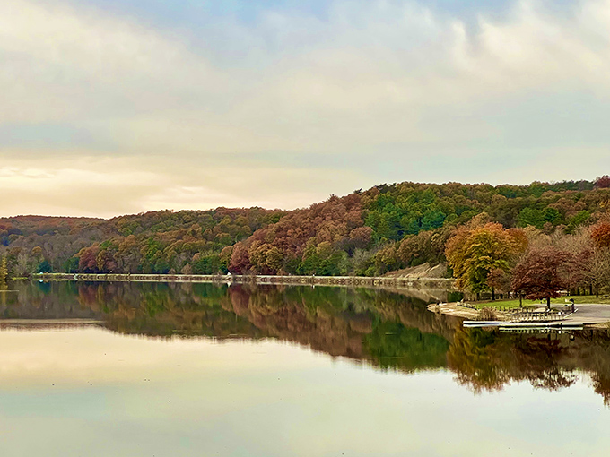 Holman Lake in autumn looks like Mother Nature spilled her entire paint palette and decided to leave it.