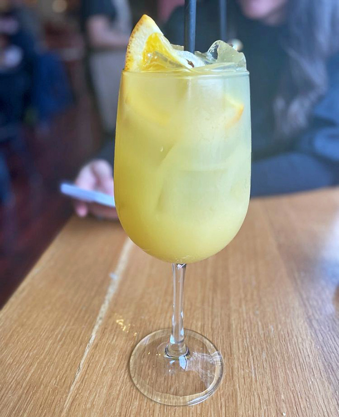Sunshine in a glass! This honey wine (tej) looks innocent enough, but like that friend who seems quiet until karaoke night, it's full of surprises.